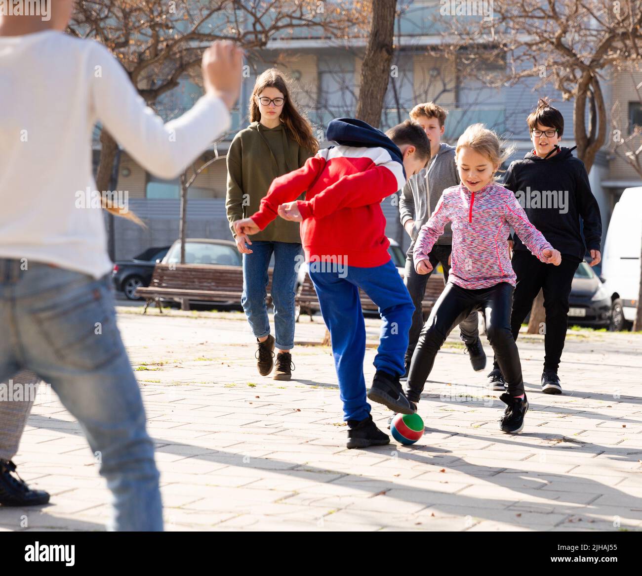 Children playing soccer with ball Stock Photo - Alamy