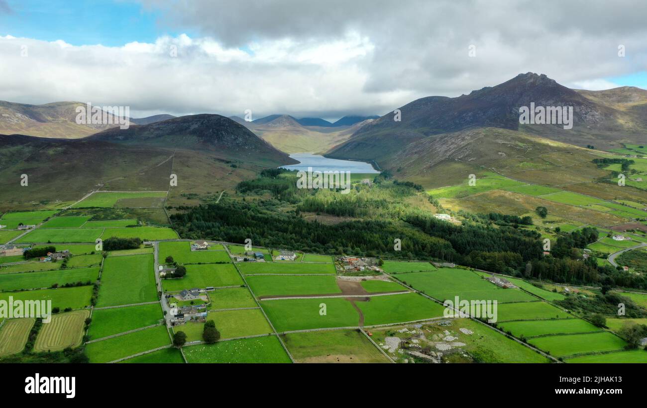 An aerial view of green pastures in the rural mountains of Northern ...
