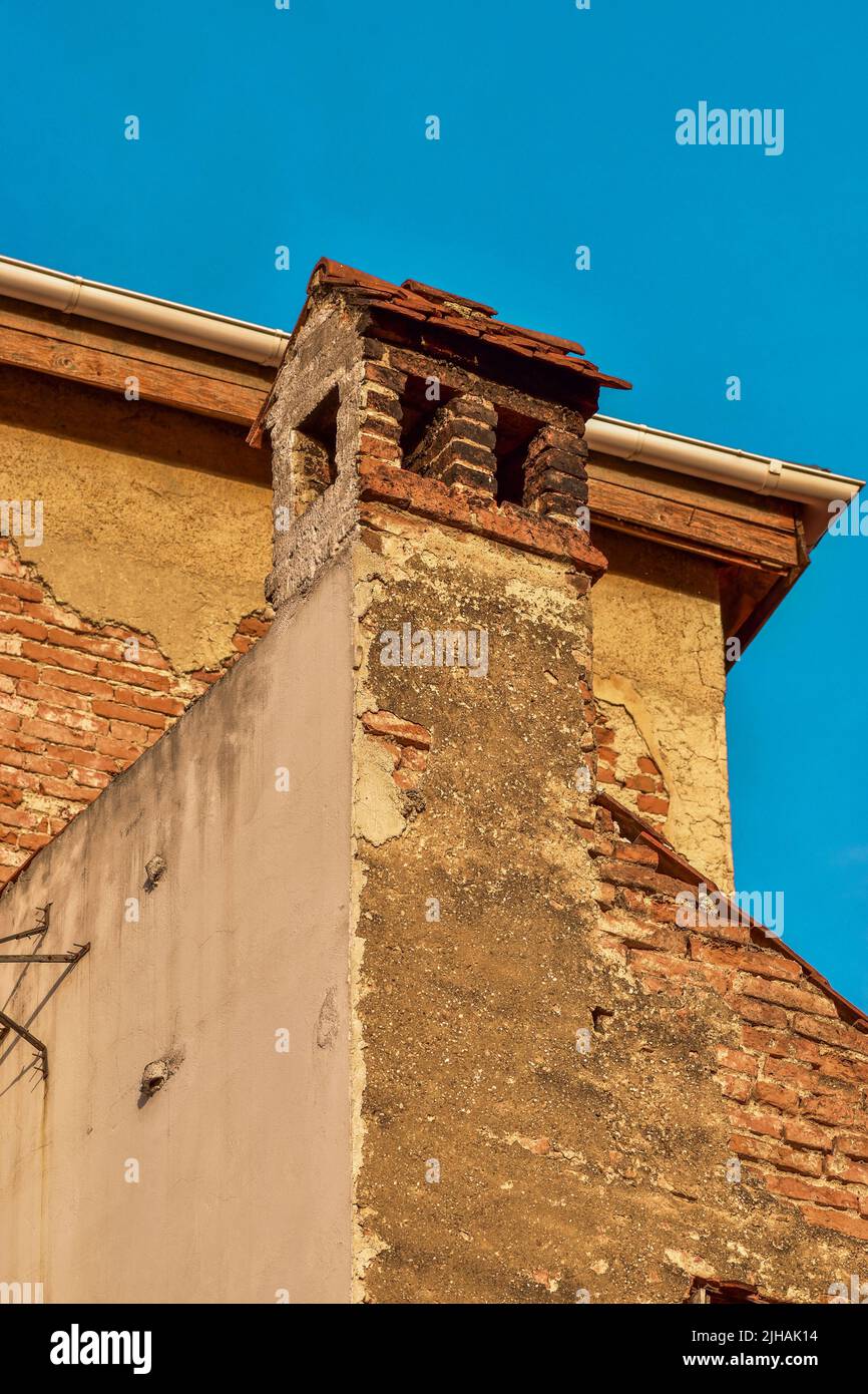 An old partially weathered brick buildings in Brasov, Romania Stock ...
