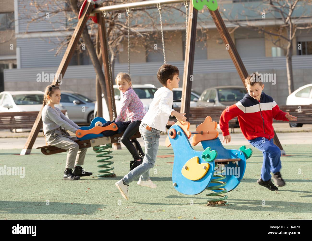Children playing on playground Stock Photo - Alamy