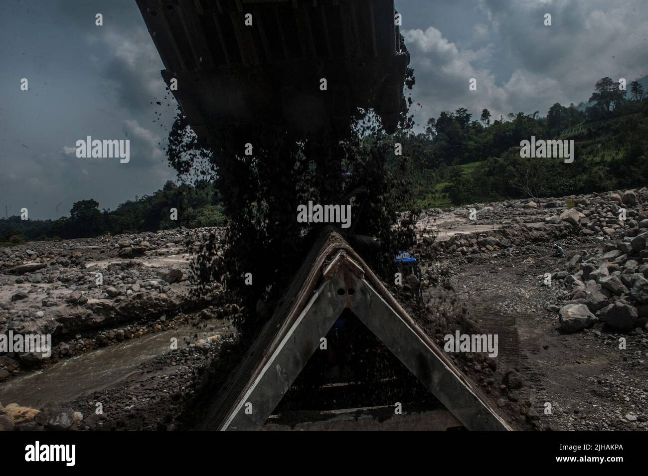 Sands mining process seen at the Sinabung volcano slopes area in Karo ...