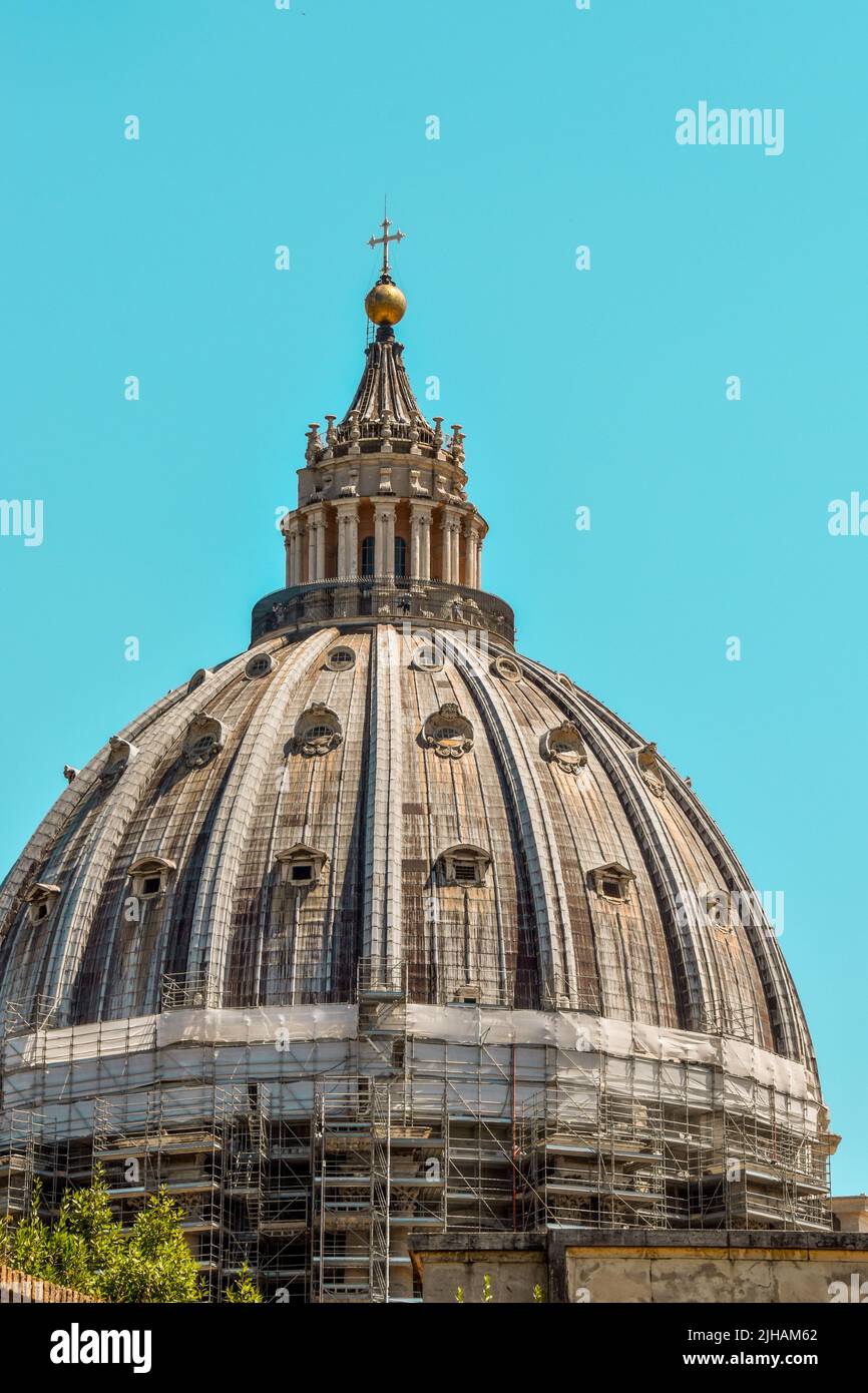 The vertical shot of the spire of the St. Peter's Basilica in Vatican ...