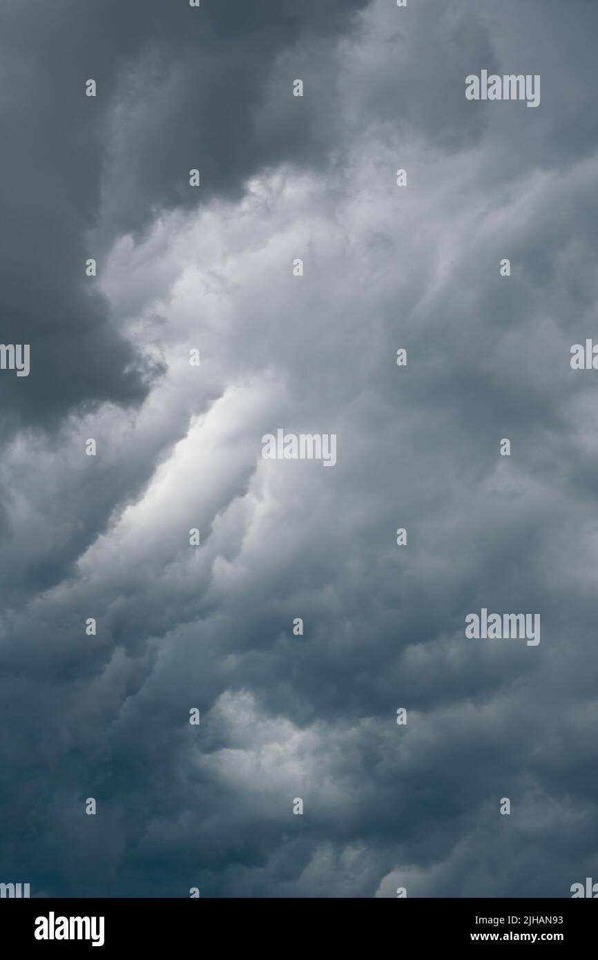 dramatic cloudy dark clouds before a storm. deep blue and grey heavy ...