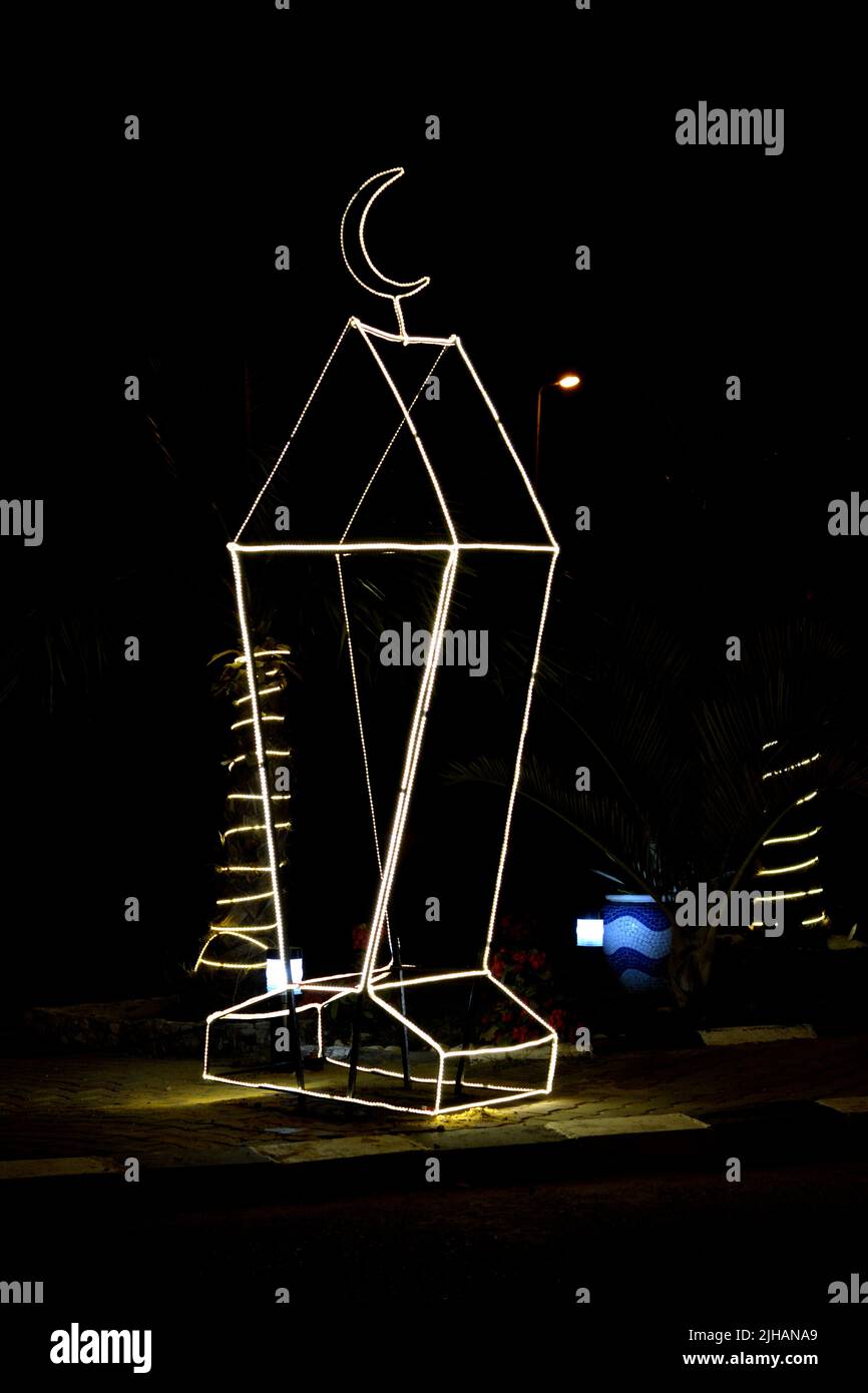 An Islamic Ramadan lantern made with led lights in the street as a ...