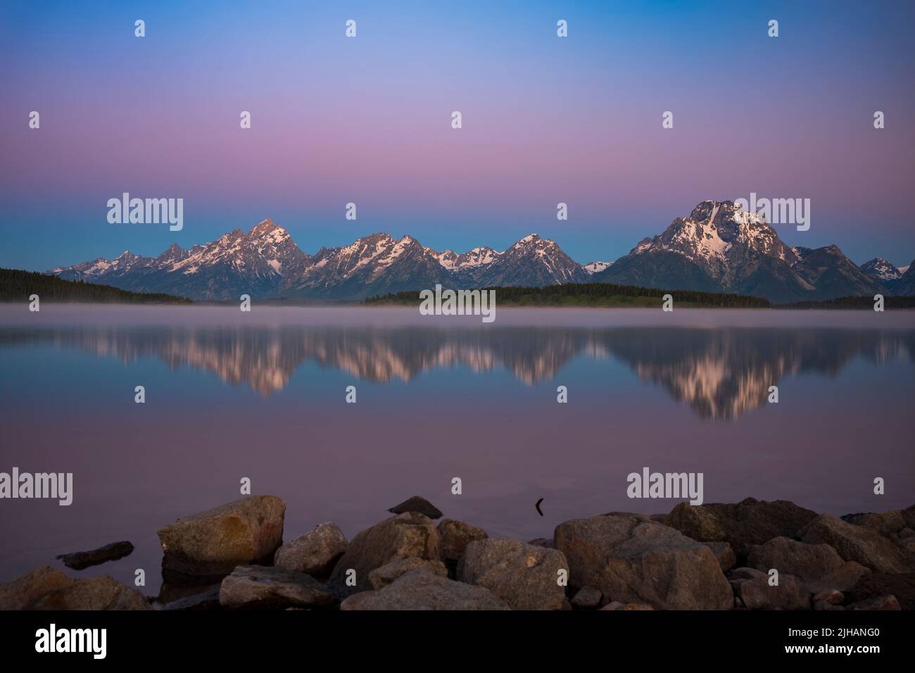 The mountain range of Grand Teton National Park is photographed during ...