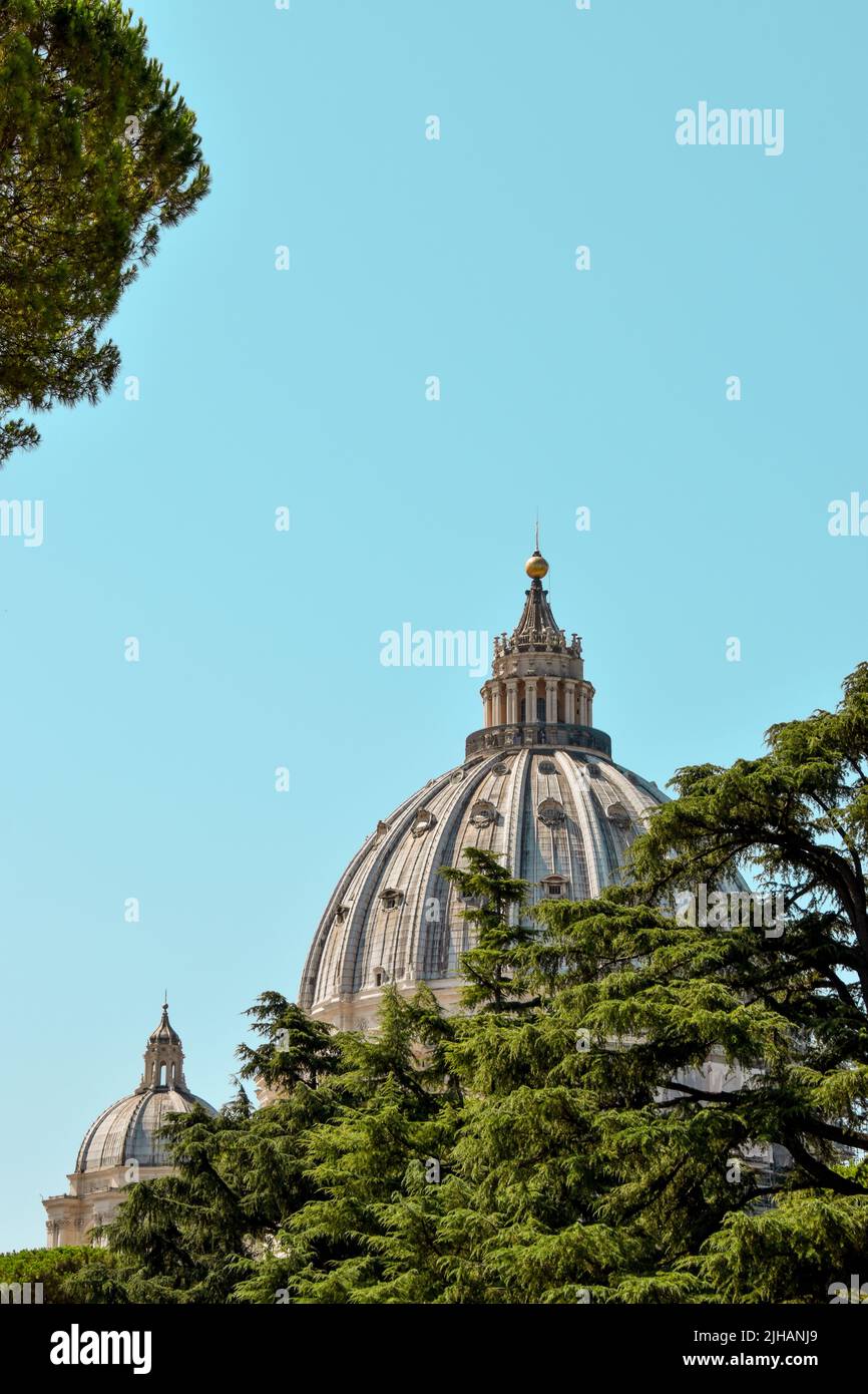 The vertical shot of the spire of the St. Peter's Basilica in Vatican ...