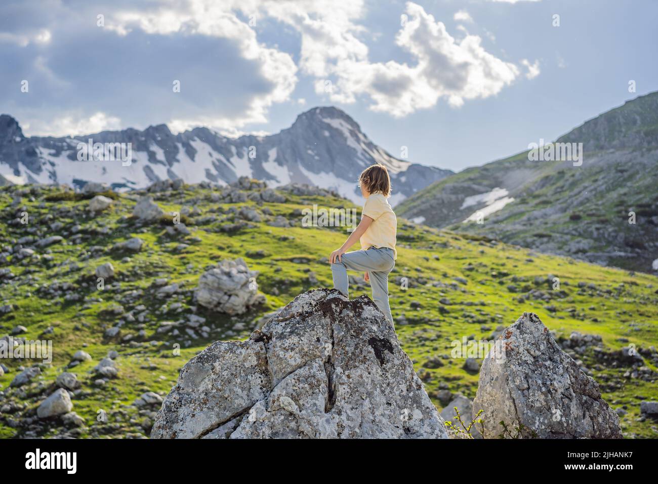 Boy tourist in Mountain lake landscape on Durmitor mountain in ...