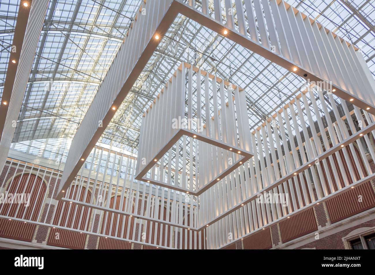 Interior design of a big hall with glass roof and large lamp Stock ...