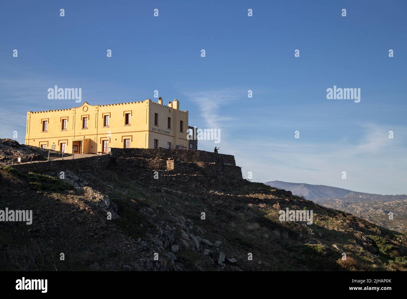 A bar-restaurant building on a hill in Cap de Creus, Spain Stock Photo ...