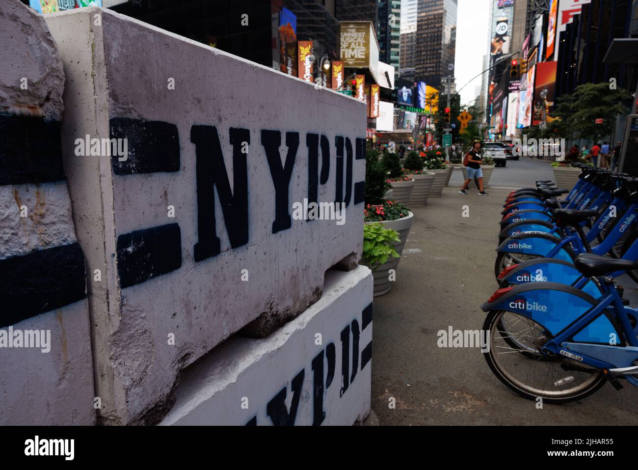NYPD spray painted barriers adjacent Citi Bikes in Manhattan's Times ...