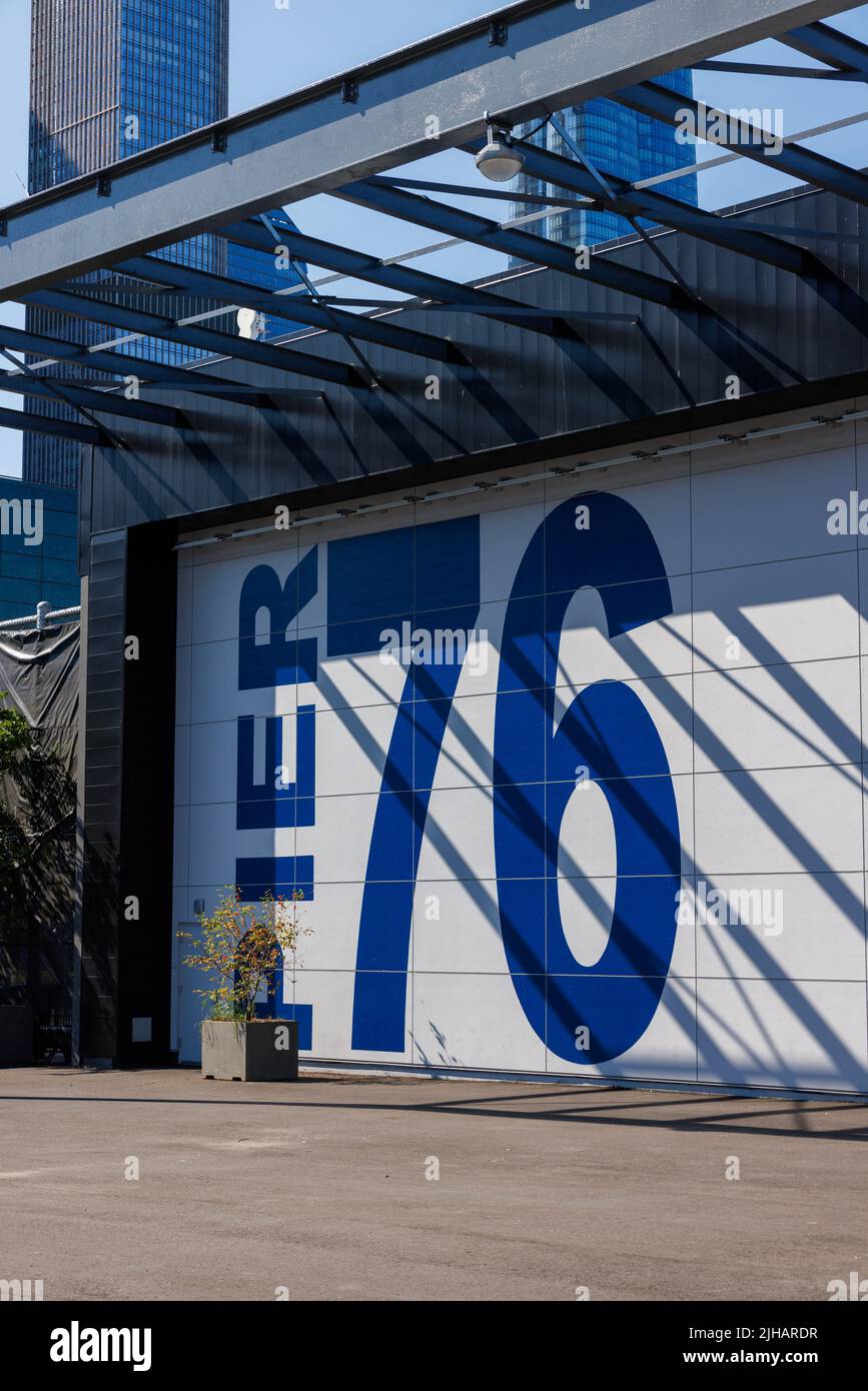 A vertical shot of Manhattan's Pier 76 Hudson River Park logo crossed ...
