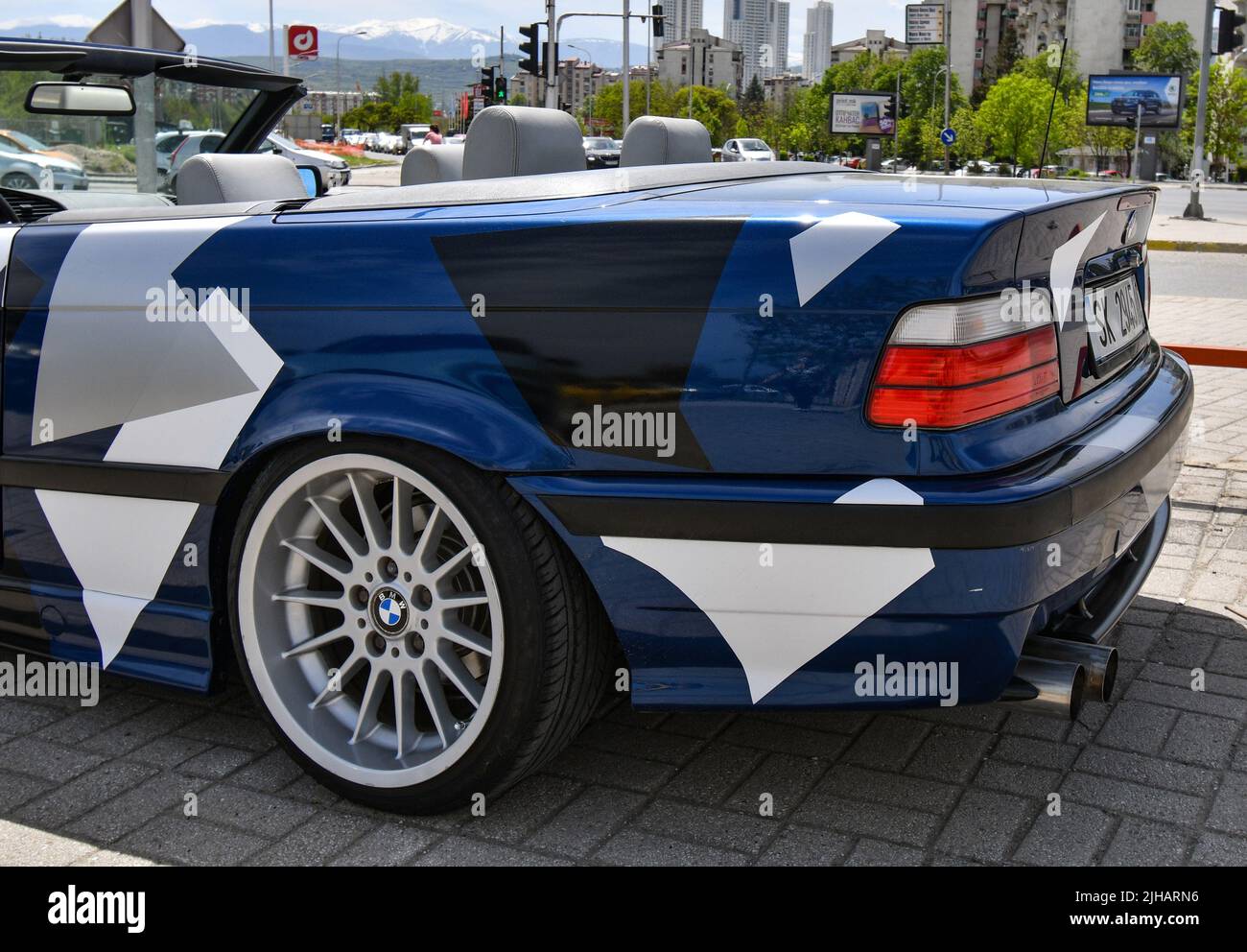View of the sport car BMW 3 e36 cabriolet with sport rims and covered ...