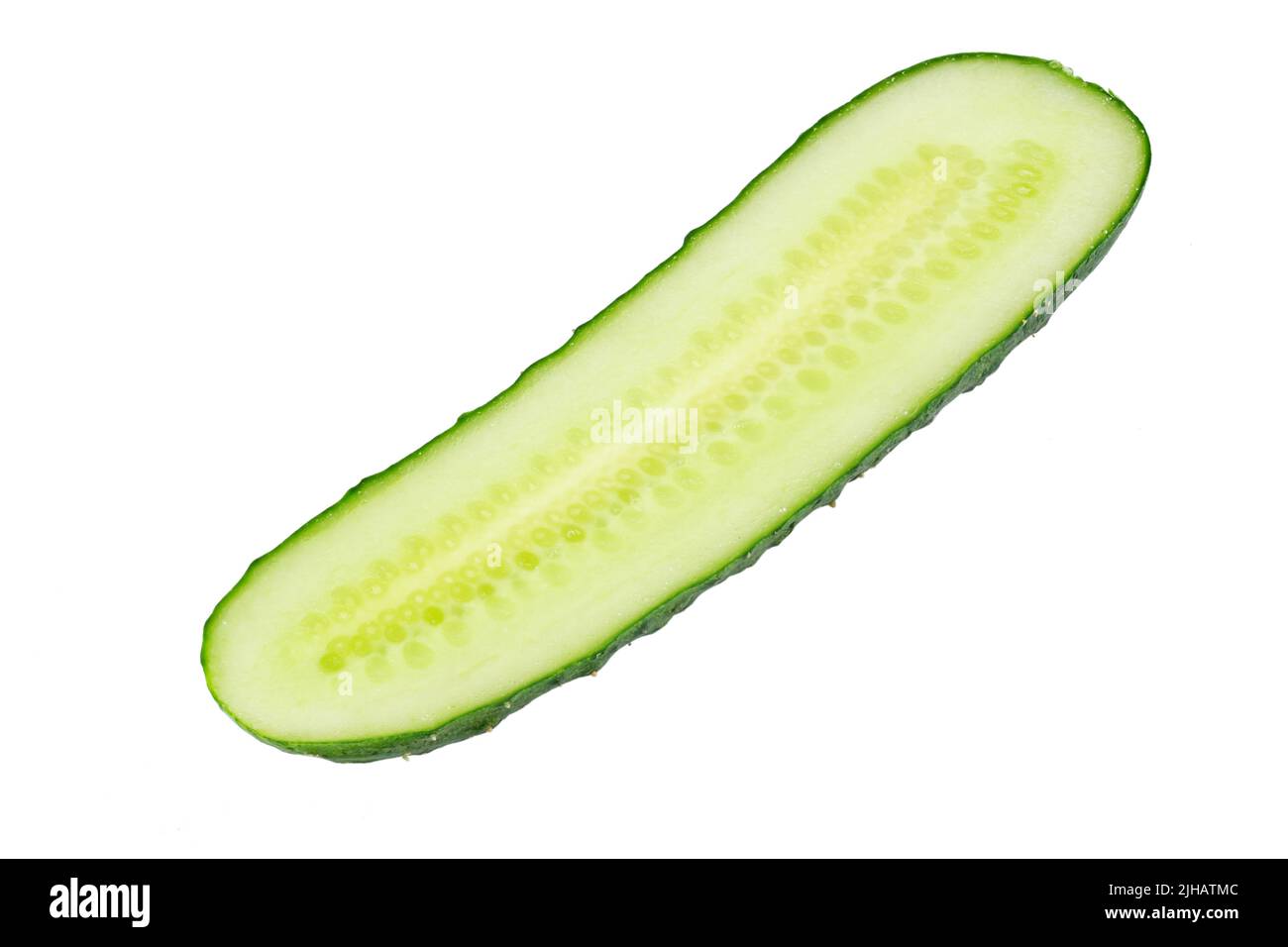Sliced cucumber isolated on white background. File contains clipping path. Full depth of field ...