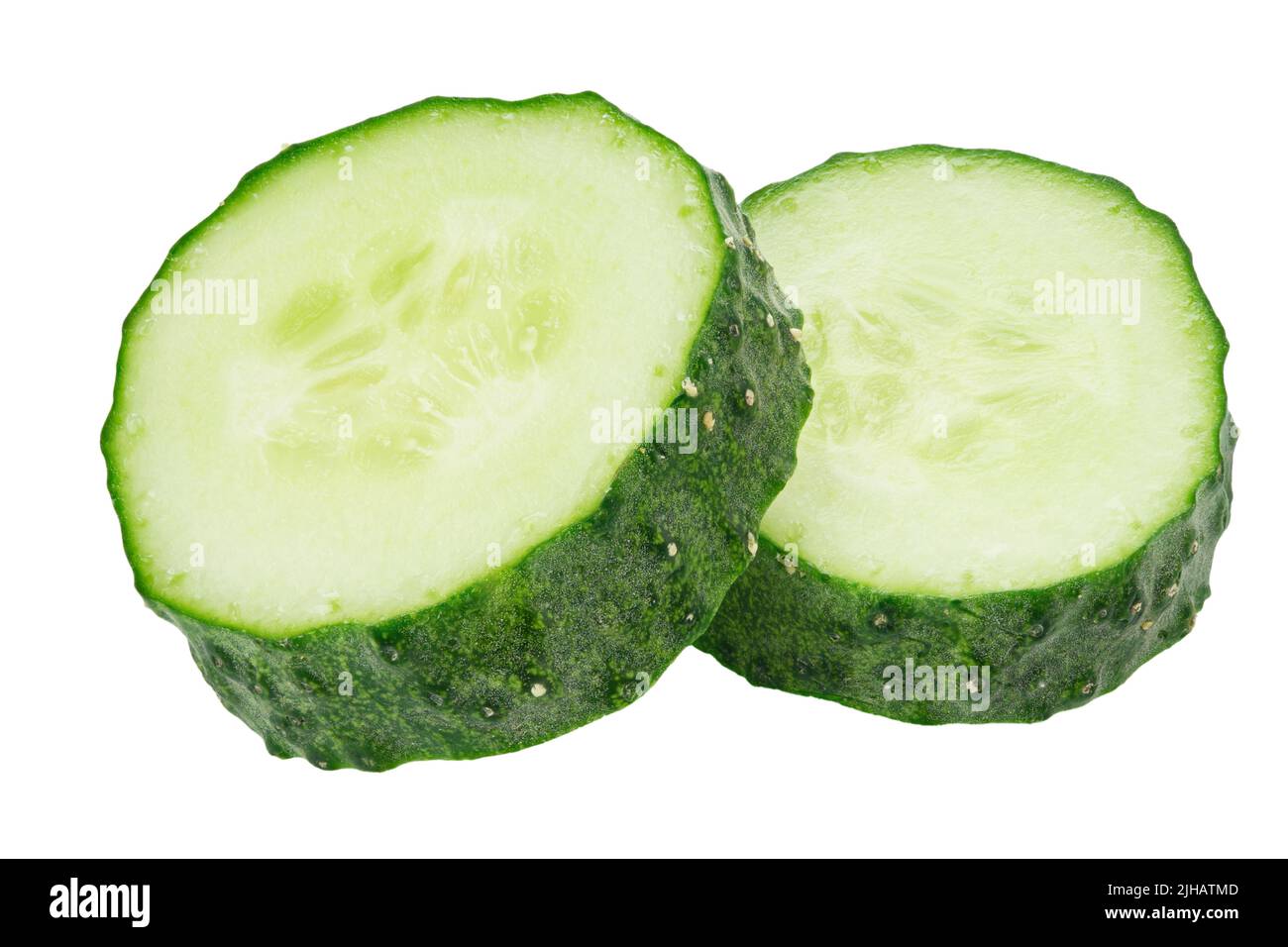 Sliced cucumber isolated on white background. File contains clipping path. Full depth of field ...