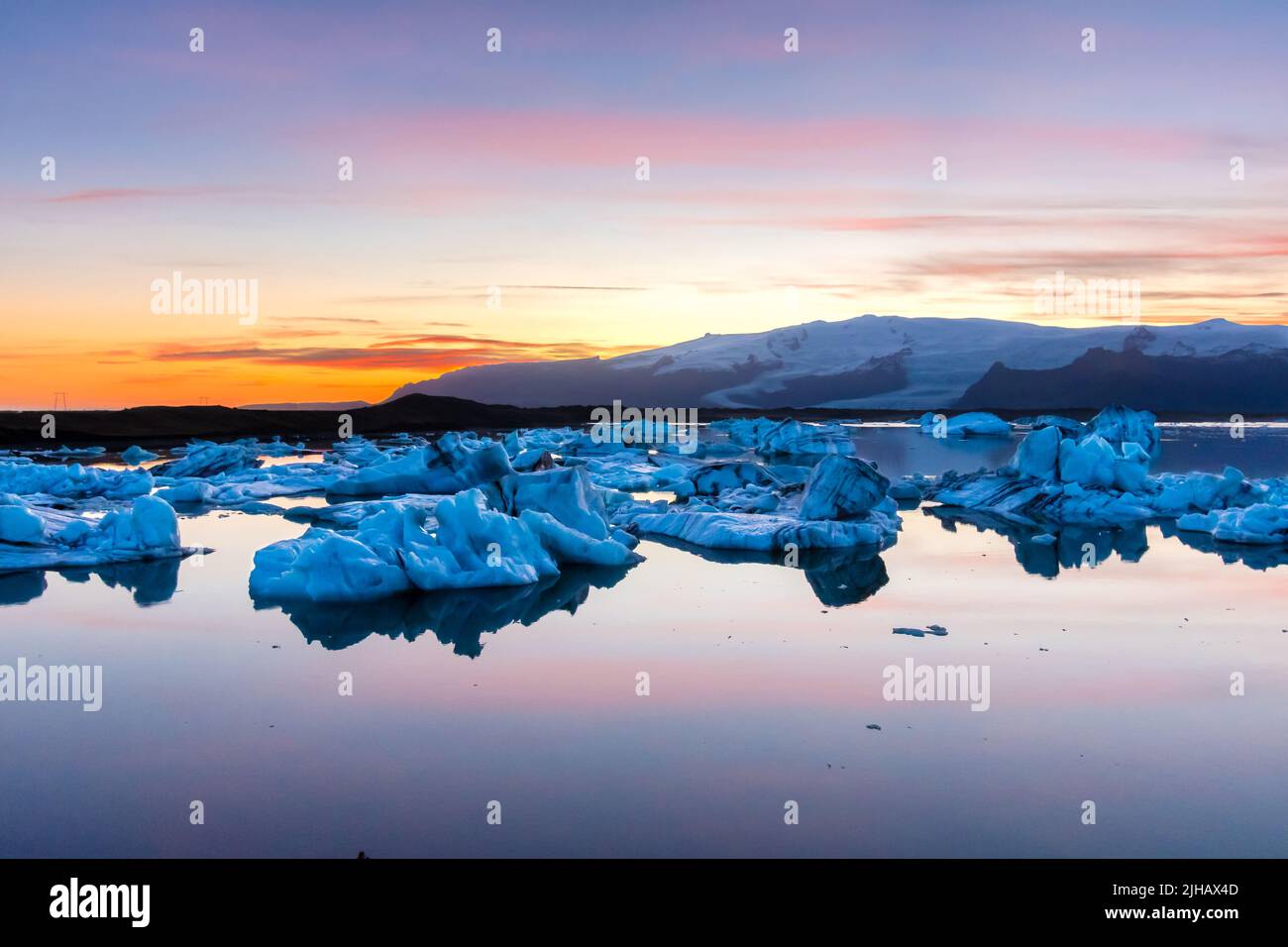 the incredible glacier in Iceland the Jökulsárlón at sunset, an ...