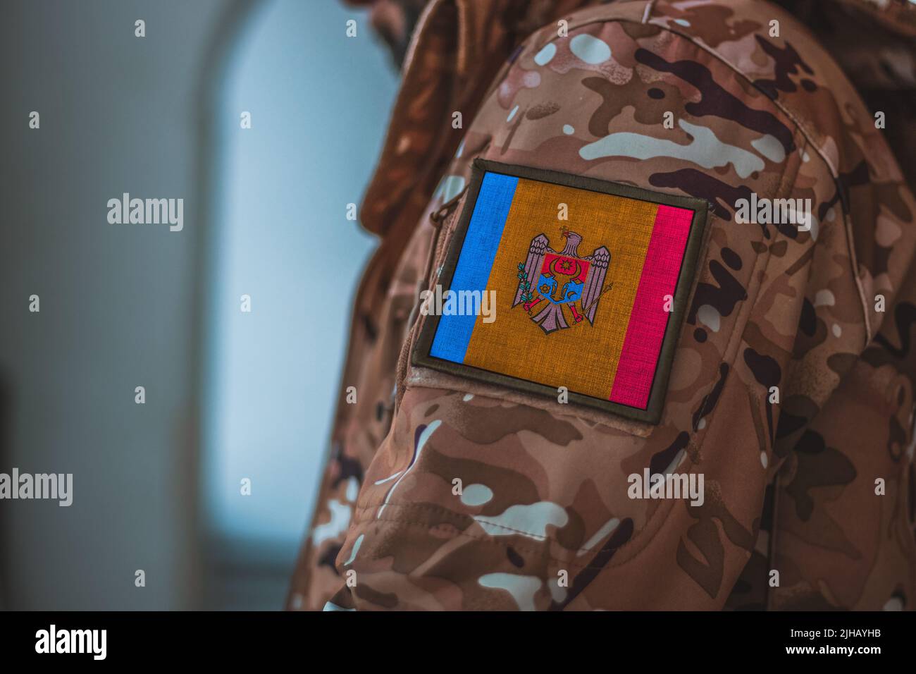 Moldova Soldier. Soldier with flag Moldova, Moldova flag on a military ...