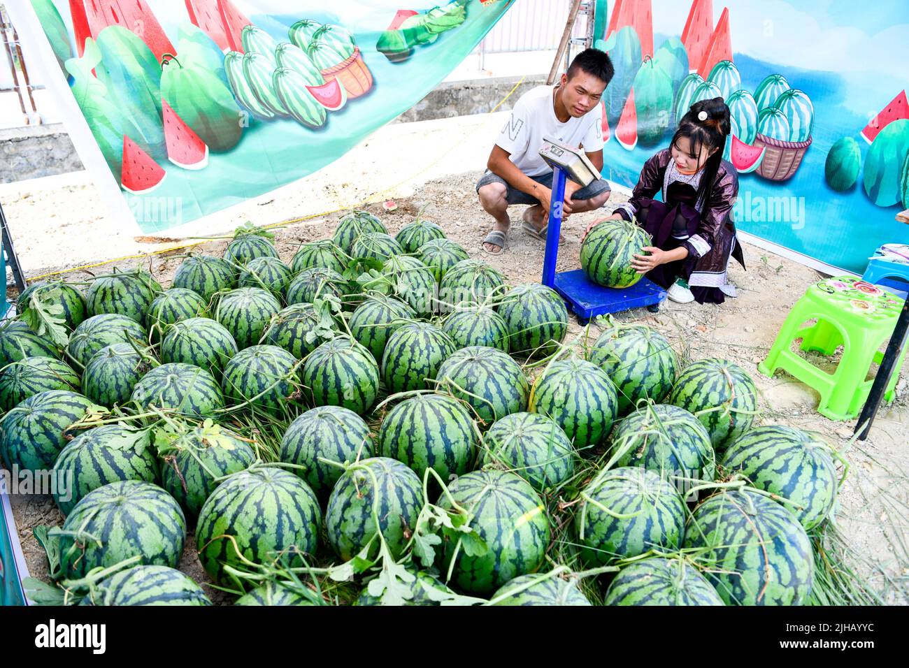 Rongjiang, China's Guizhou Province. 15th July, 2022. Villagers promote ...