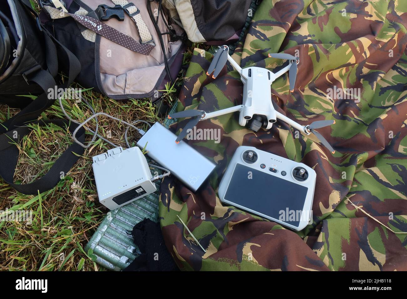 DJI mini 3 pro drone on a British Army Goretex Camouflage bivvi Stock ...