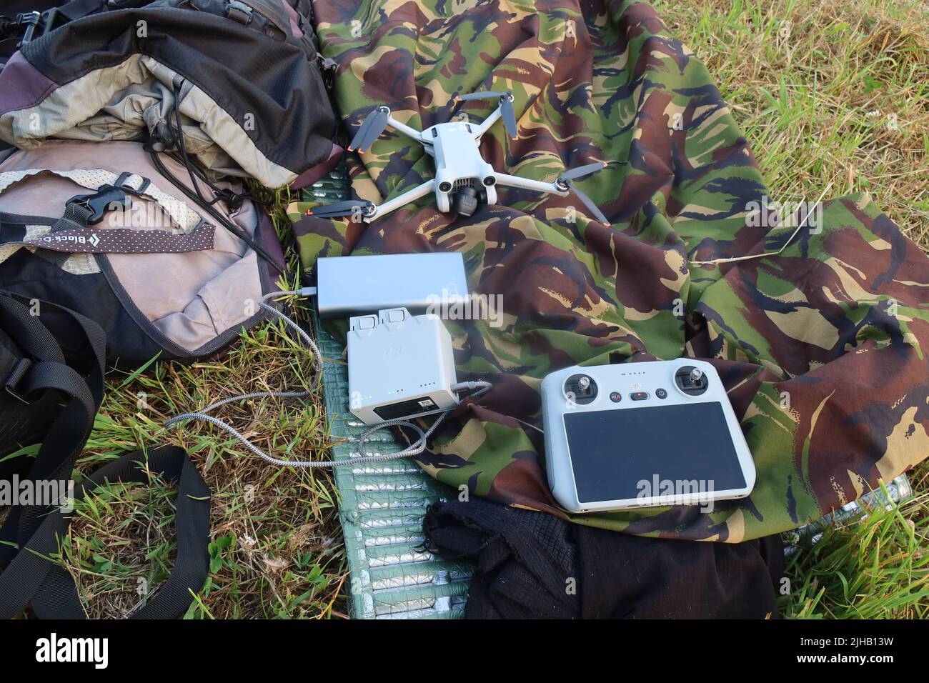 DJI mini 3 pro drone on a British Army Goretex Camouflage bivvi Stock ...