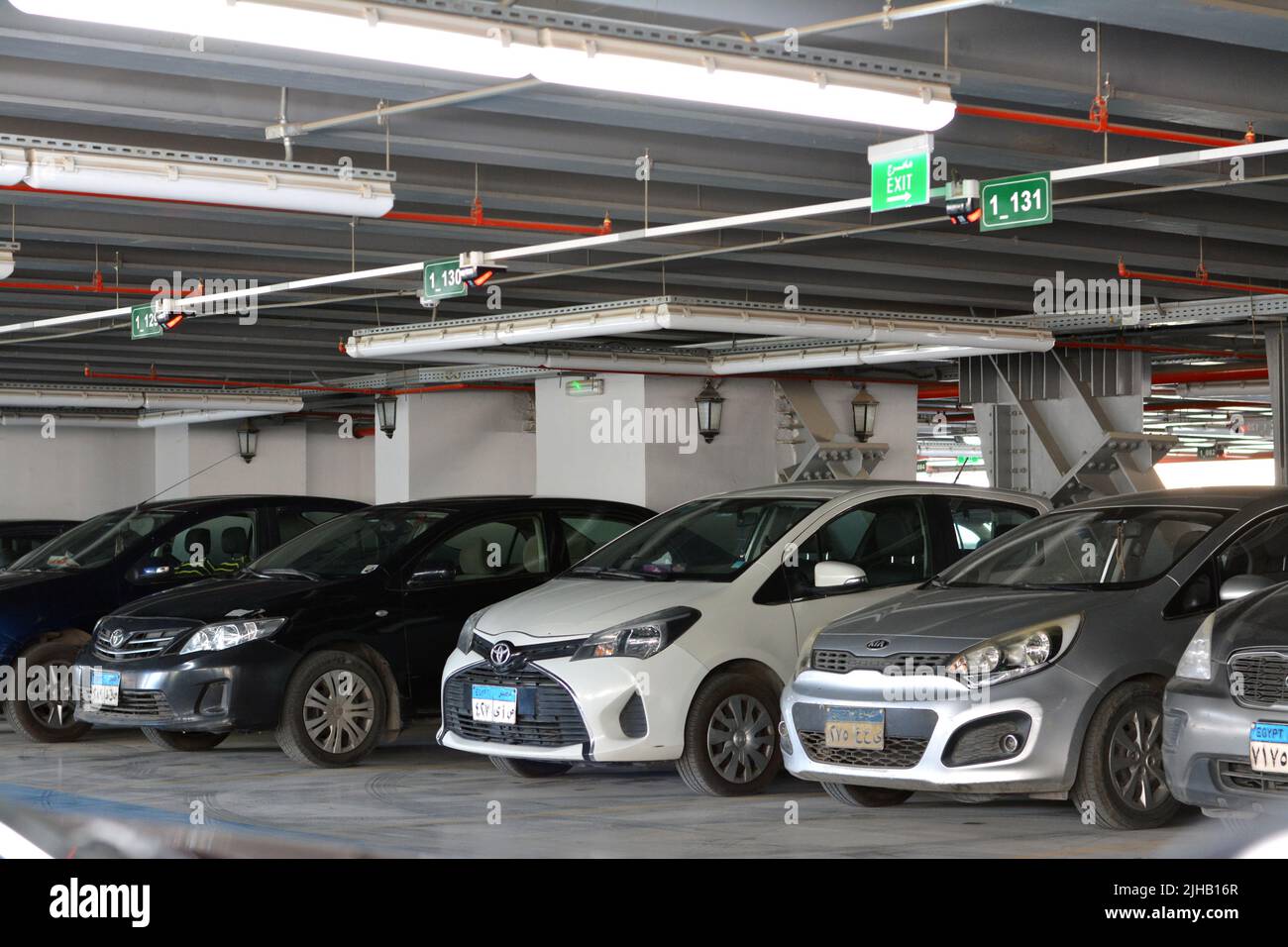 Cairo, Egypt, April 14 2022: Parked cars inside a multilevel parking ...