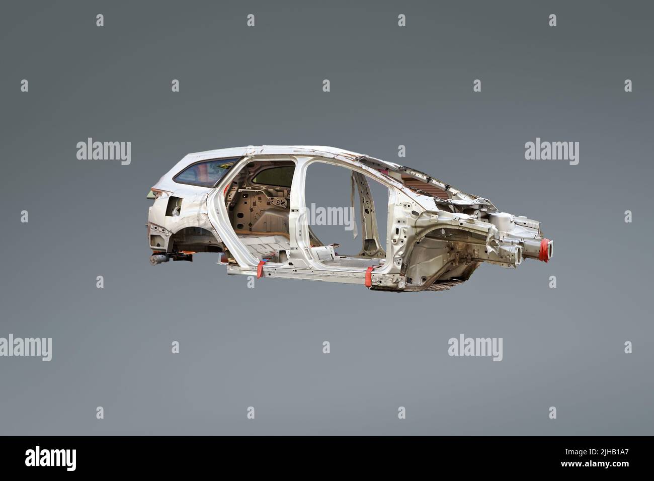 White modern damaged car chassis or body , outer metallic part of car ...