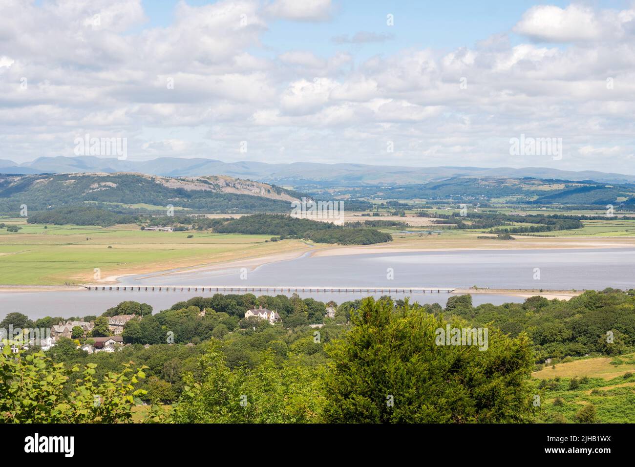 A view of Arnside railway viaduct and the river Kent estuary from above ...