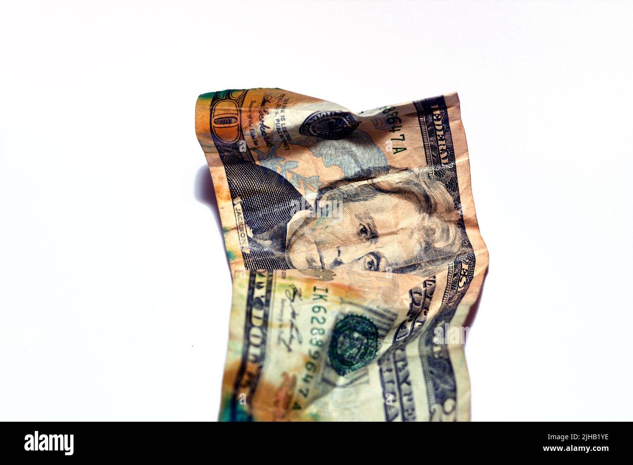 Selective focus of crumpled obverse American money of 20 $ twenty ...