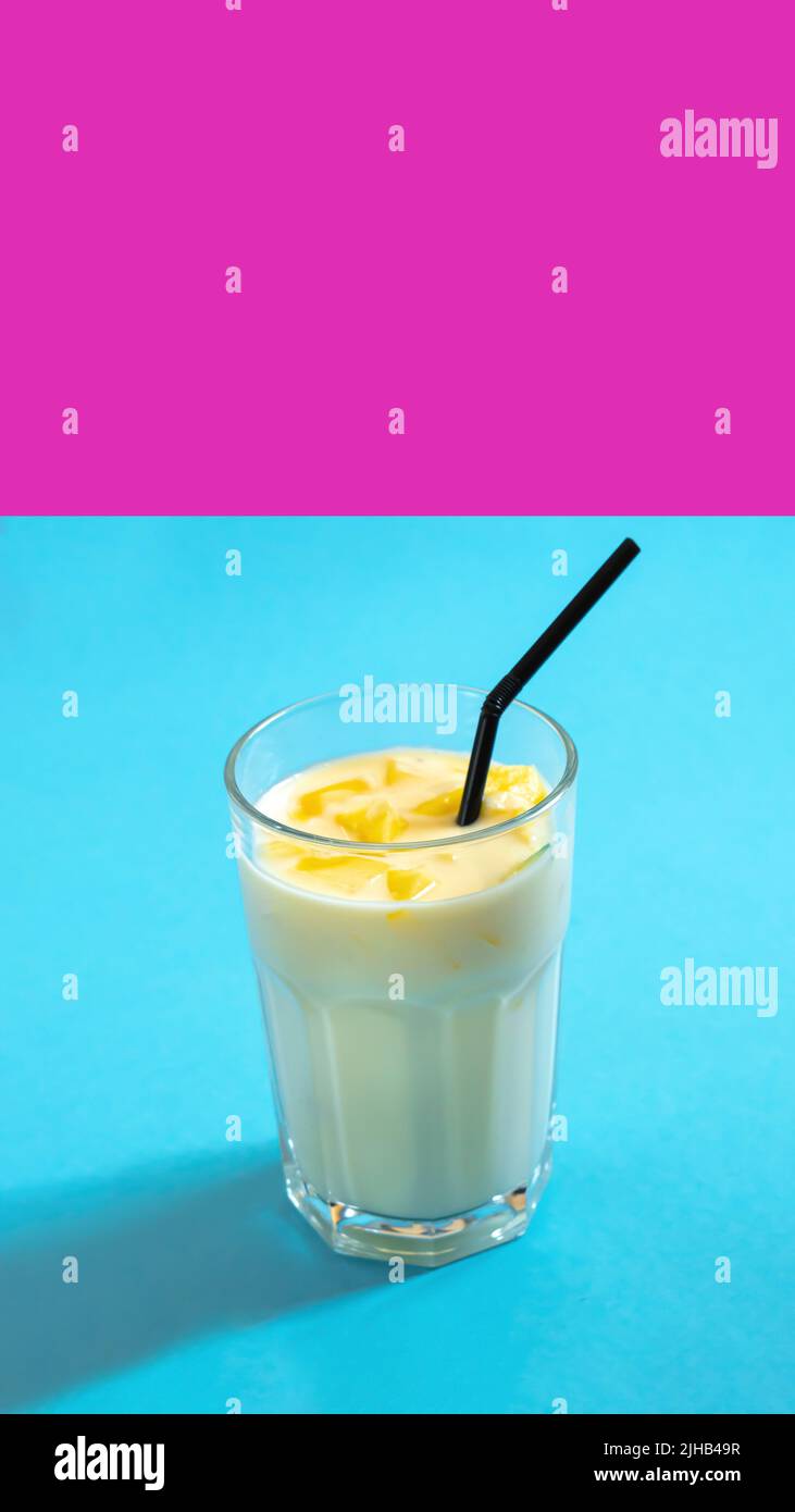 conceptual frame. A drink in neon. Milk milkshake lassi on a neon ...