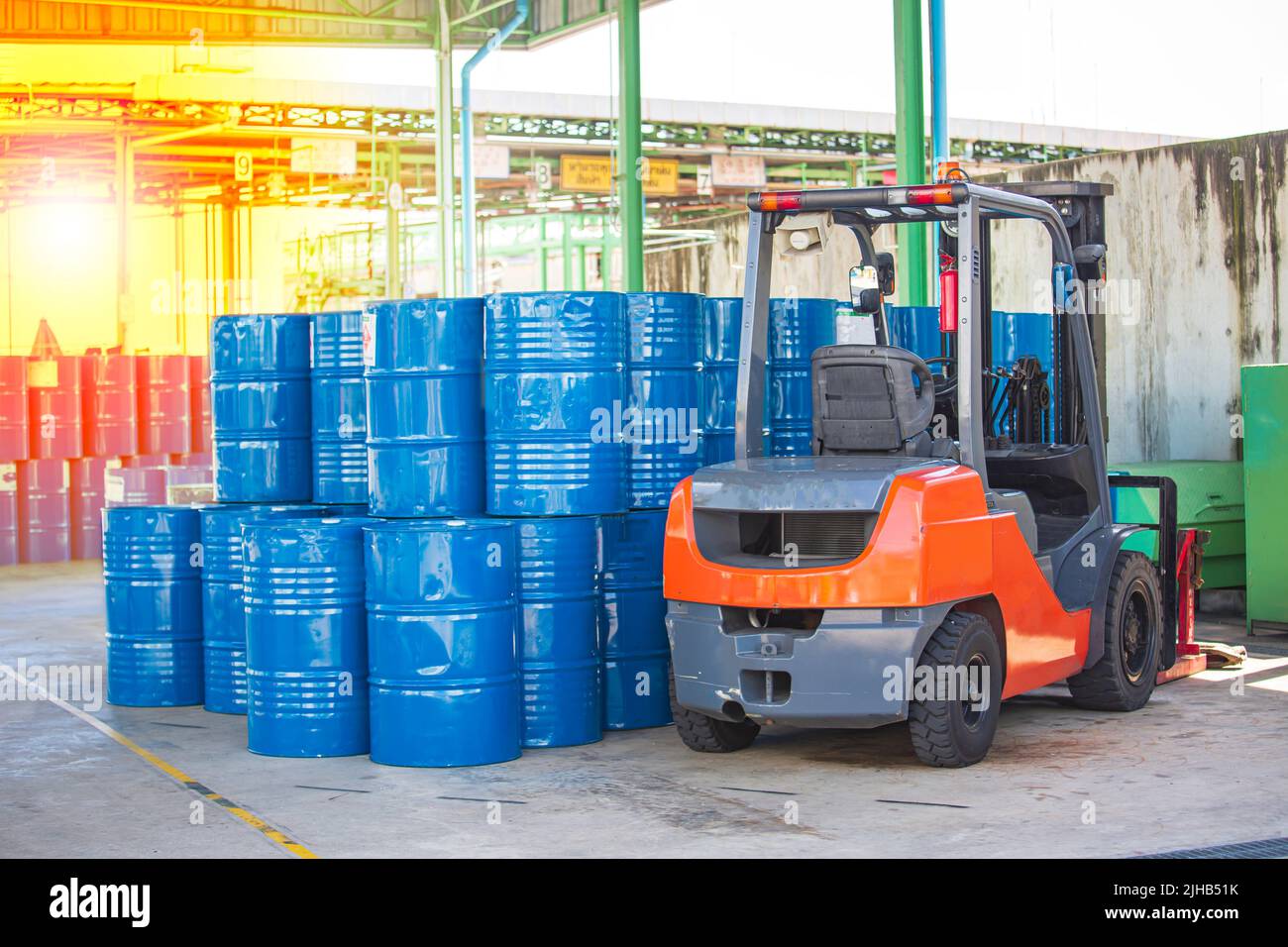 Oil barrels forklift truck move for on the transportation truck Stock ...