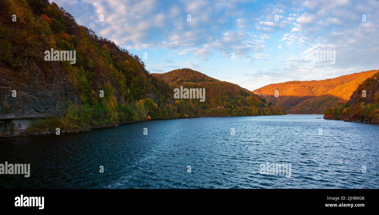 mountain lake lacul tarnita at sunrise. beautiful autumnal countryside ...