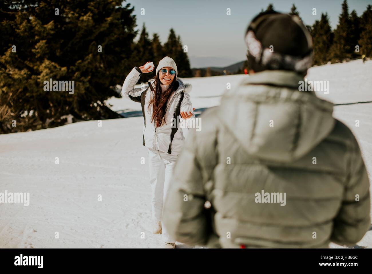 Two people snowball fight on hi-res stock photography and images - Alamy
