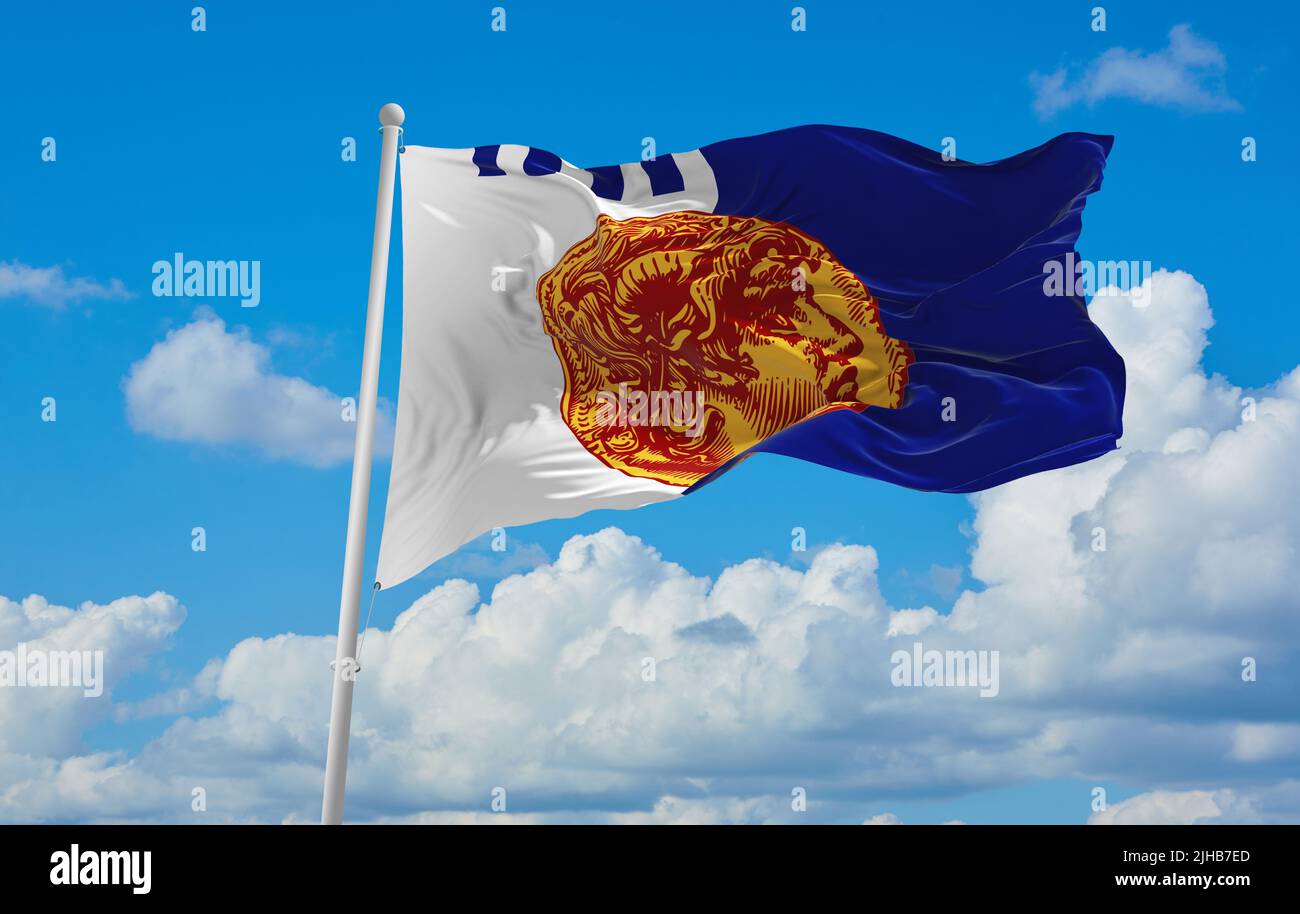 official flag of Thessaloniki Greece at cloudy sky background on sunset ...