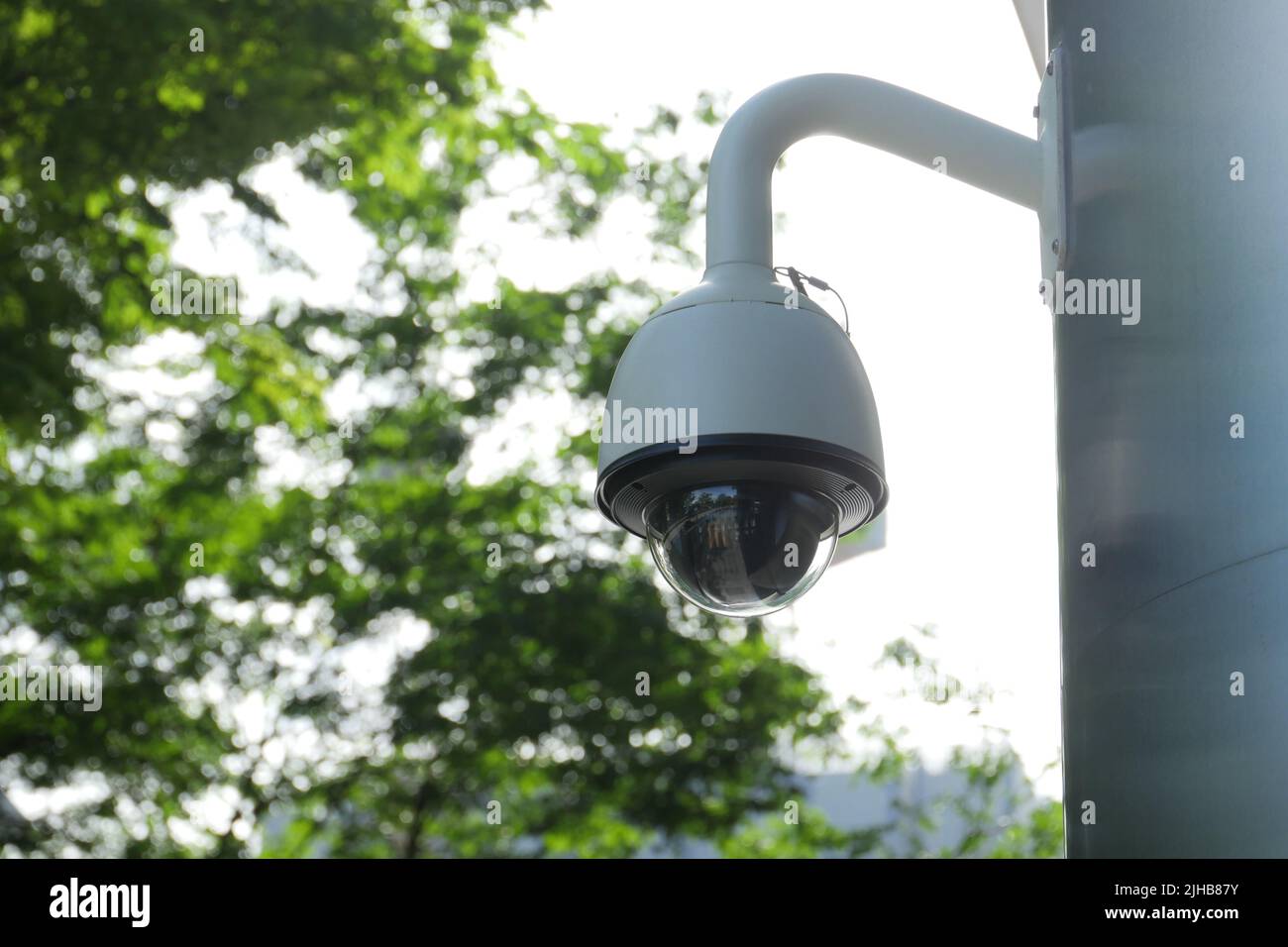 CCTV security camera operating outdoor Stock Photo - Alamy