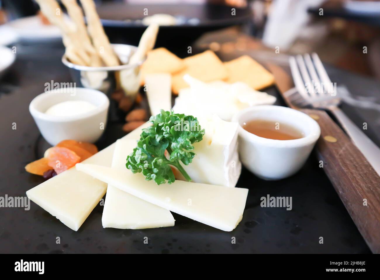 Cold cuts with salami ,crackers dried fruit and different types of ...