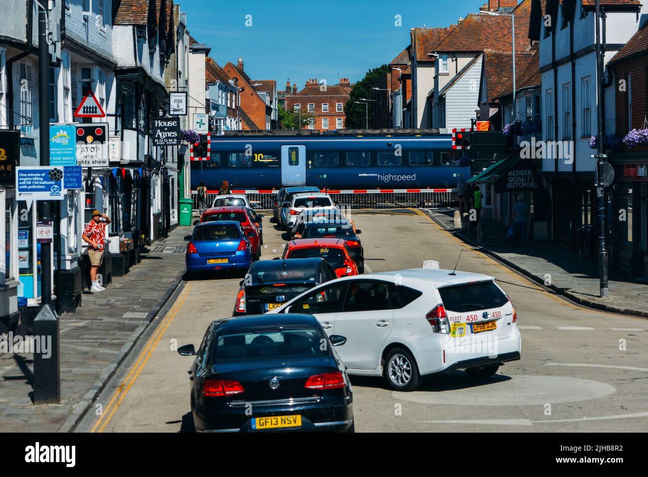 High speed train passing a rail crossing on Wincheap in Canterbury ...