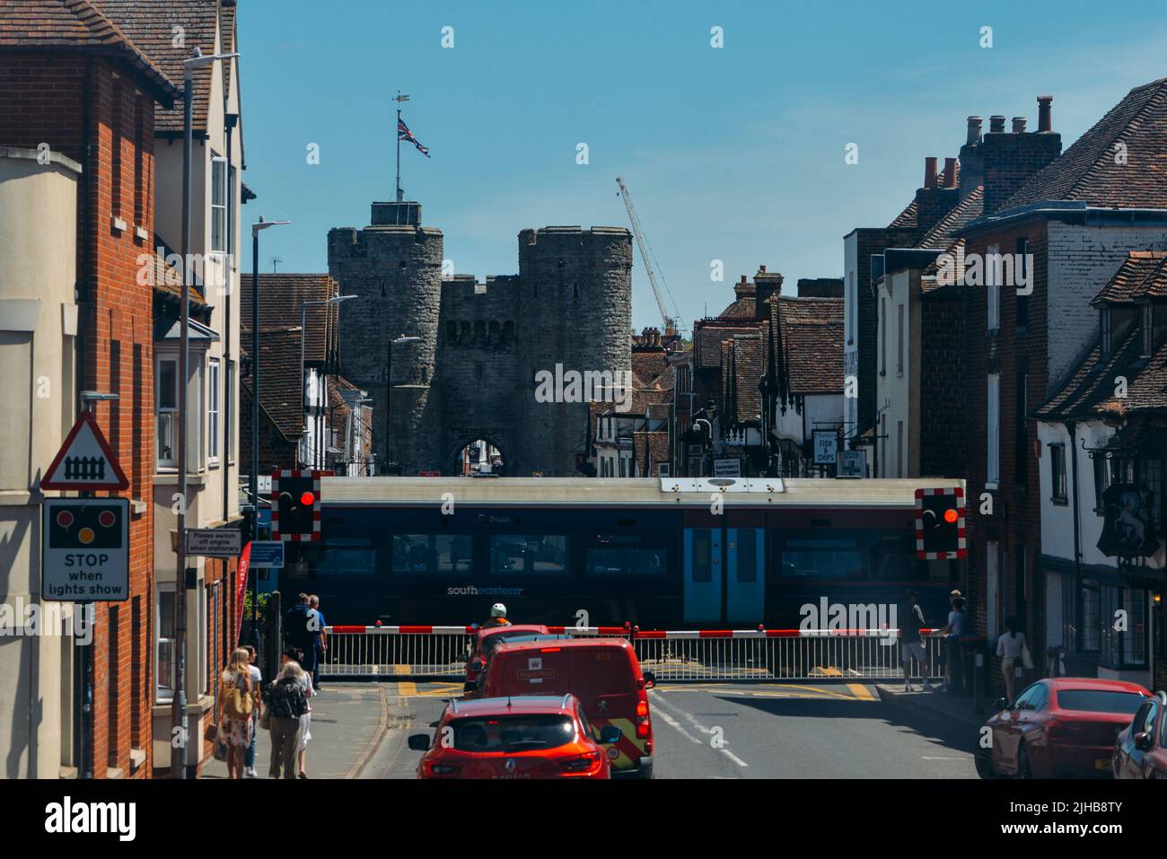 High speed train passing a rail crossing on Wincheap in Canterbury ...