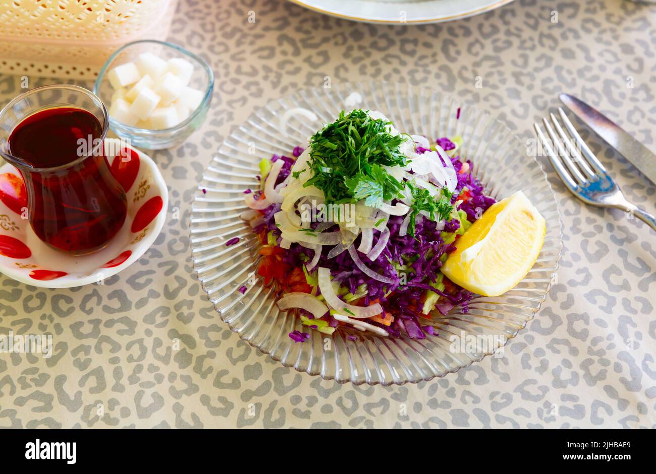 Turkish salad from red cabbages, cucumbers, tomatoes and onion with ...