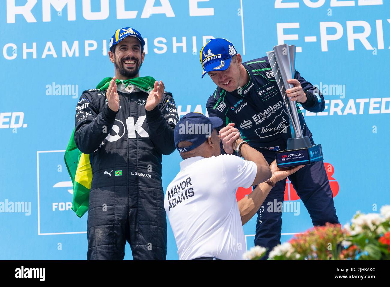 Mayor Eric Adams gives trophy to Nick Cassidy of Envision Racing team ...