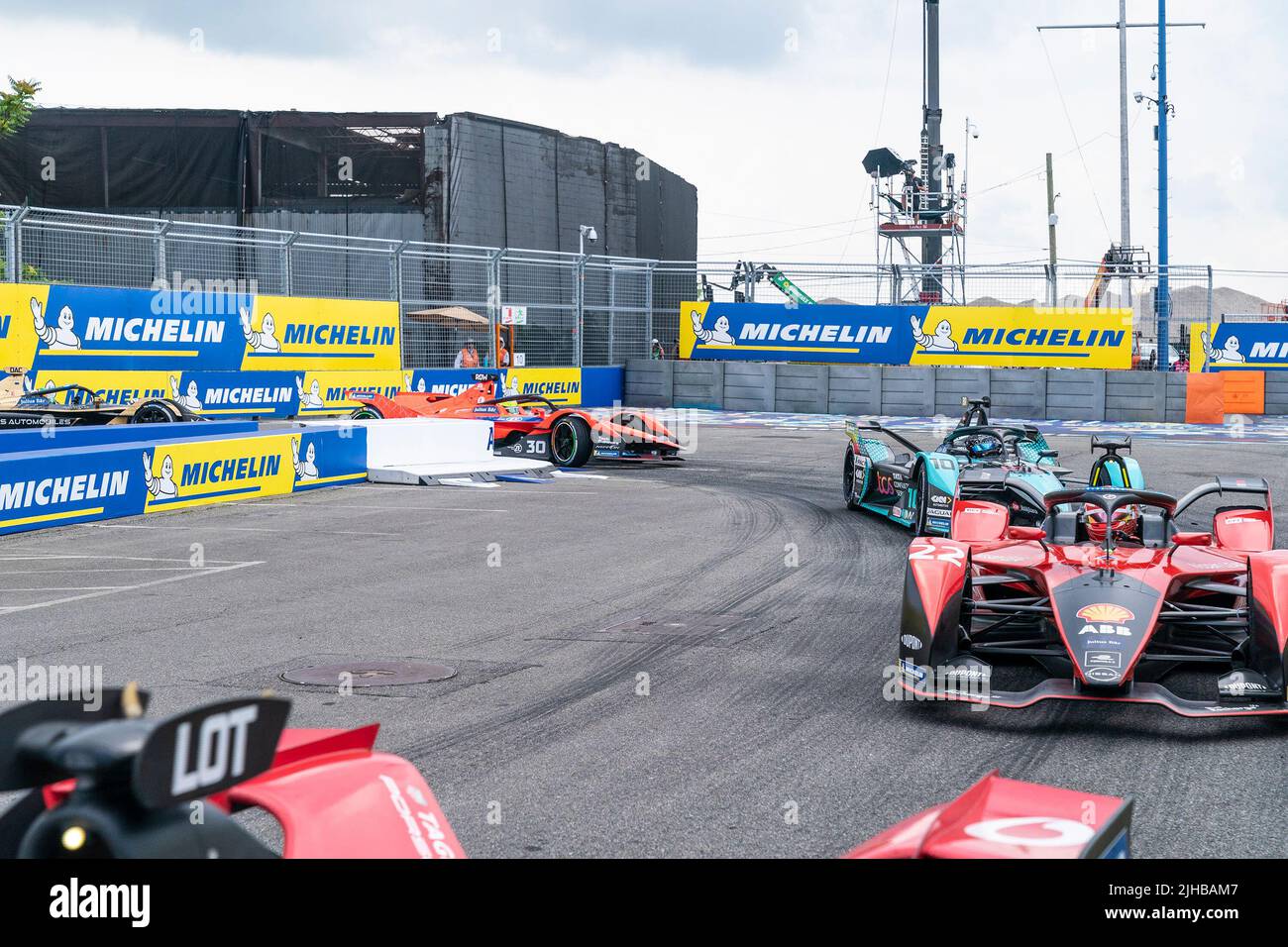 Cars driven along the tracks during round 11 of Formula E racing at ...