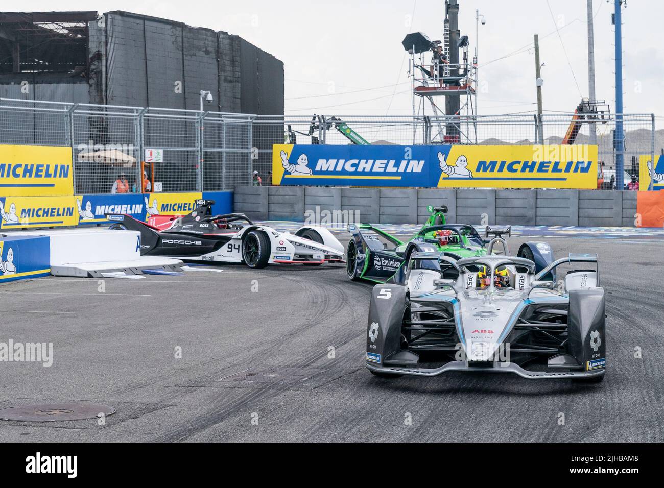 Cars driven along the tracks during round 11 of Formula E racing at ...