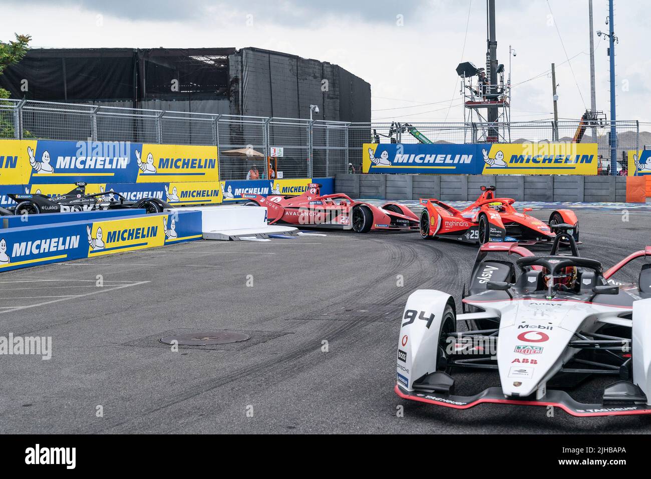 Cars driven along the tracks during round 11 of Formula E racing at ...