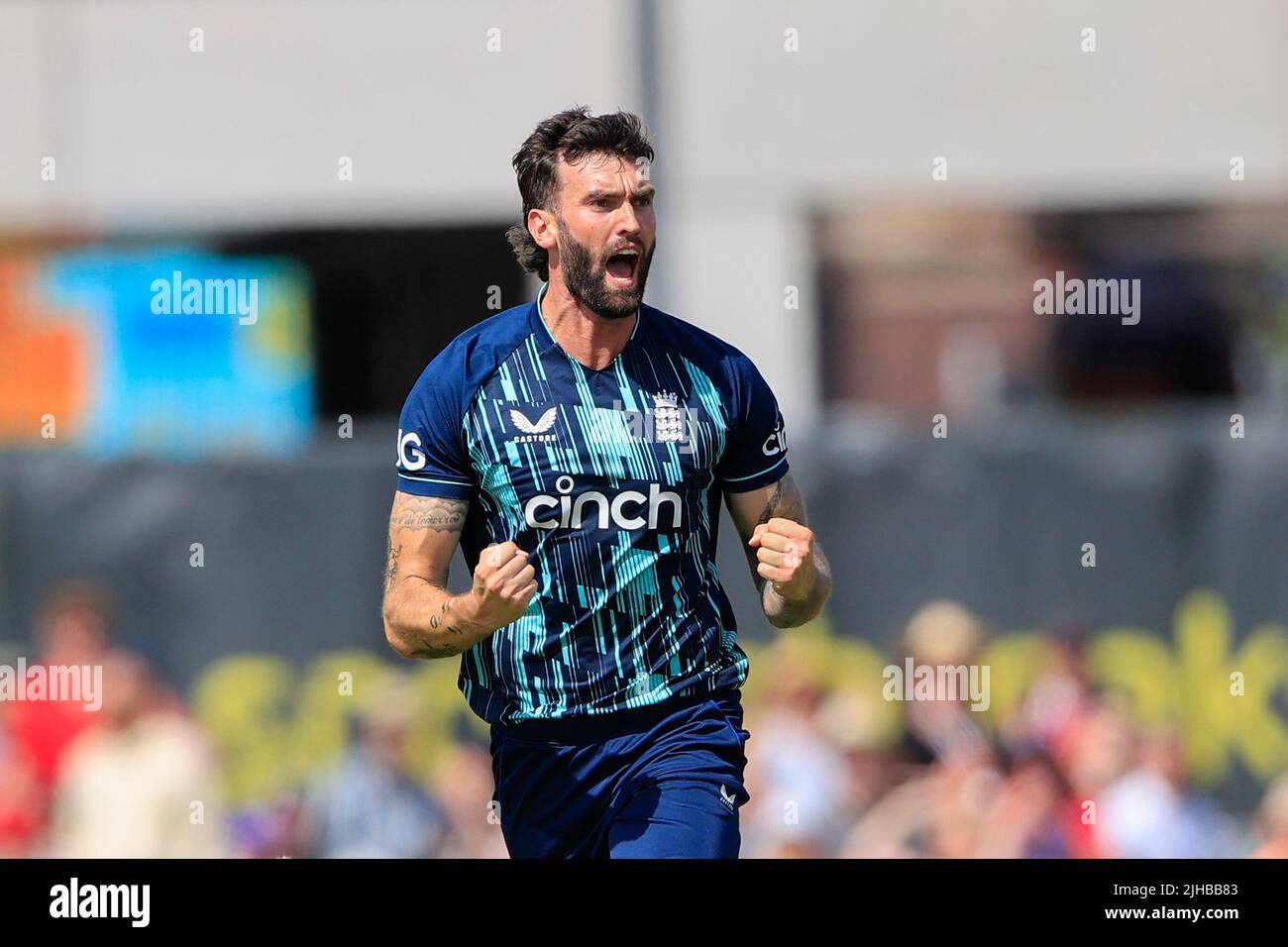 Reece Topley of England celebrates taking the wicket of Shikhar Dhawan ...