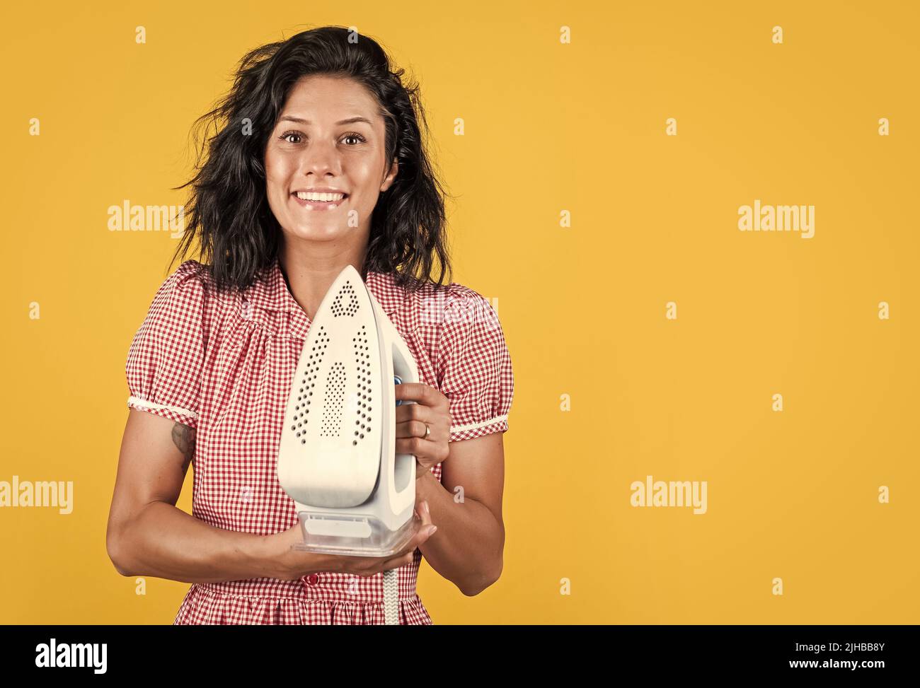 concept of householding. steaming iron. pinup girl prepare ironing ...
