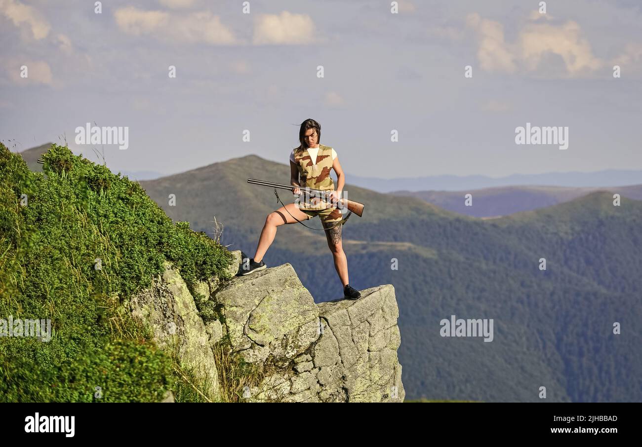 Sniper concept. Girl military warrior rifle. Observing point. Woman ...