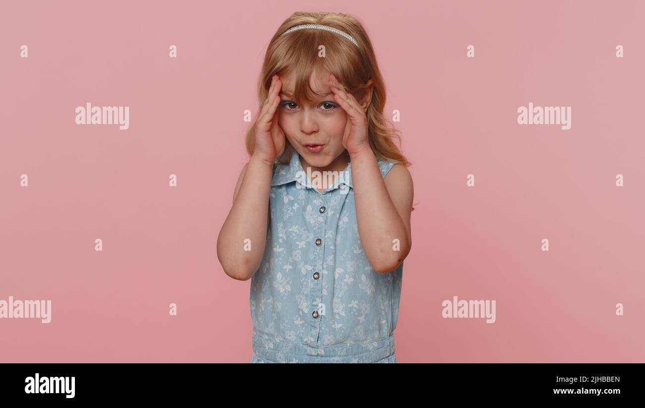 Nosy curious young preteen child girl kid closing eyes with hand and ...