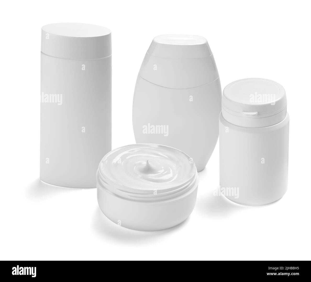 close up of a white beauty cream container and tube on white background ...