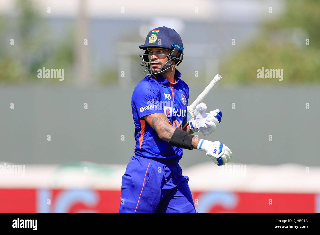 Rohit Sharma of India walks back to the pavilion after he is caught by ...