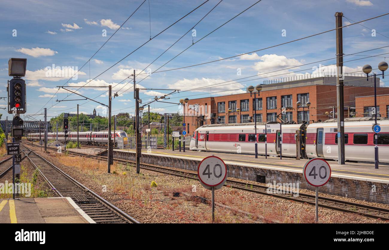 Two intercity trains face each other at the end of a railway station ...