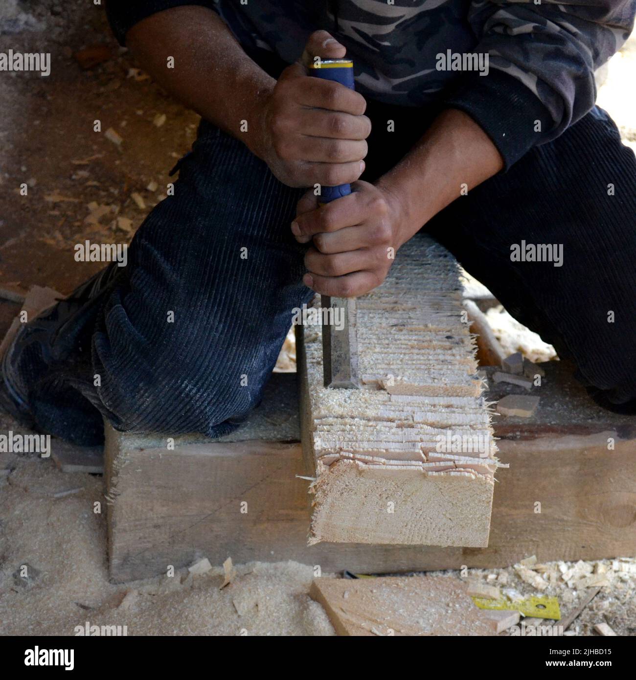 Carpenter working with a chisel Stock Photo - Alamy