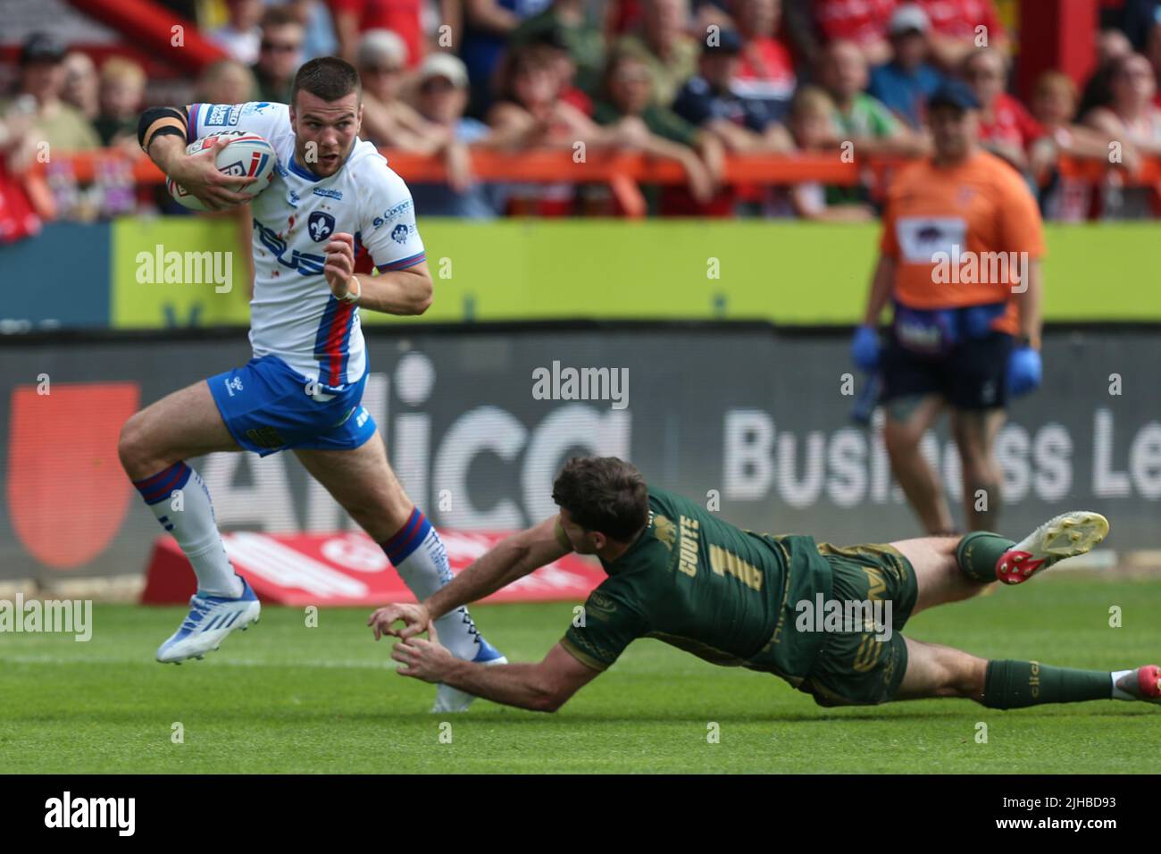 Max Jowitt #1 of Wakefield Trinity gets past Lachlan Coote #1 of Hull ...